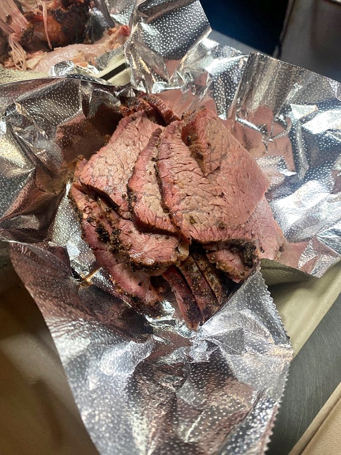 Tri-tip, California's contribution to the barbecue pantheon, sliced to perfection with that ideal balance of smoke, seasoning, and beefiness that makes conversation temporarily impossible.