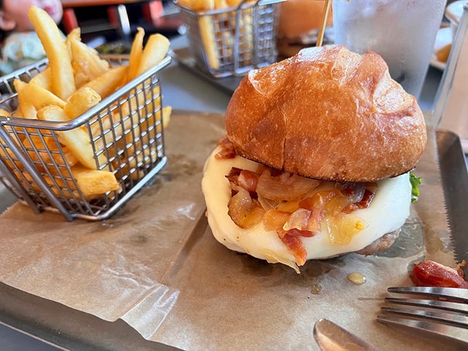 This burger isn't just wearing its Sunday best&mdash;it's dressed for the culinary equivalent of the Met Gala, complete with caramelized onions and melty cheese.
