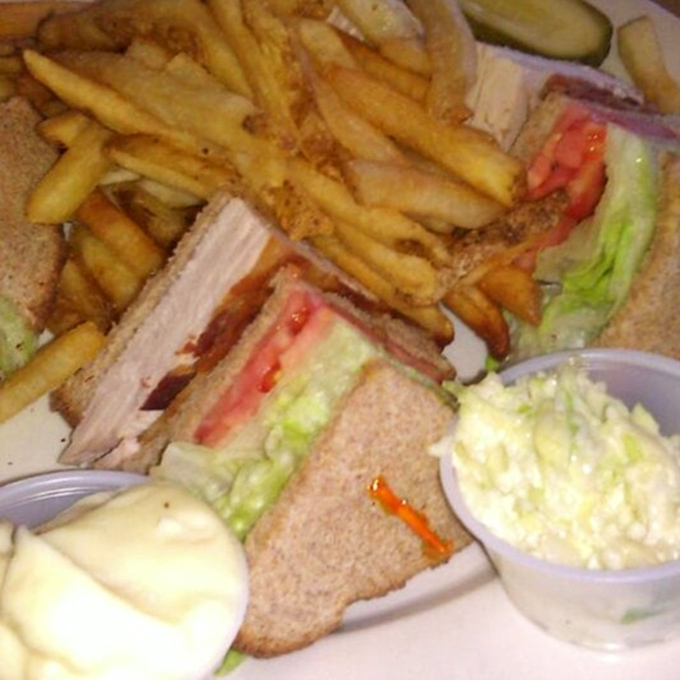 This triple-decker masterpiece proves that some engineering projects are delicious, filling, and come with absolutely no traffic delays.