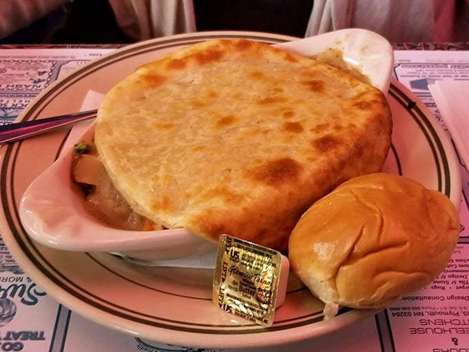 Comfort in a crust. This pot pie doesn't just warm your stomach; it hugs your soul with golden-brown pastry and savory filling.