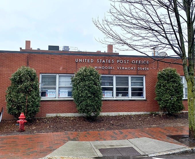 Even the post office has character here, wrapped in ivy like it's auditioning for a New England postcard.