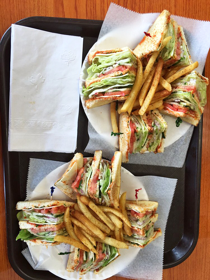 Even the club sandwiches get the royal treatment here &ndash; stacked high with fresh ingredients and served with golden, crispy fries.