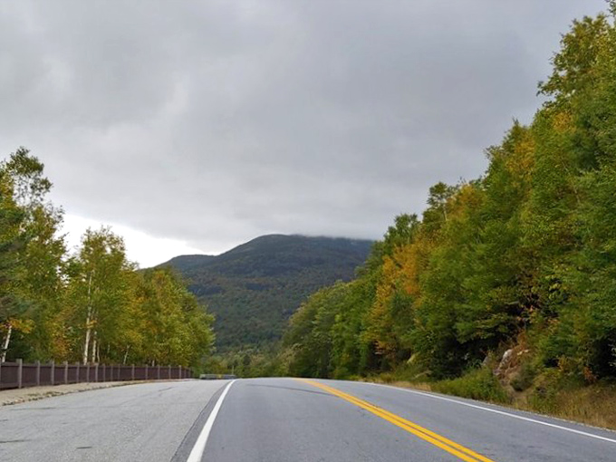 The road less traveled, but absolutely should be: Route 26 winding through Grafton Notch like nature's own scenic runway.