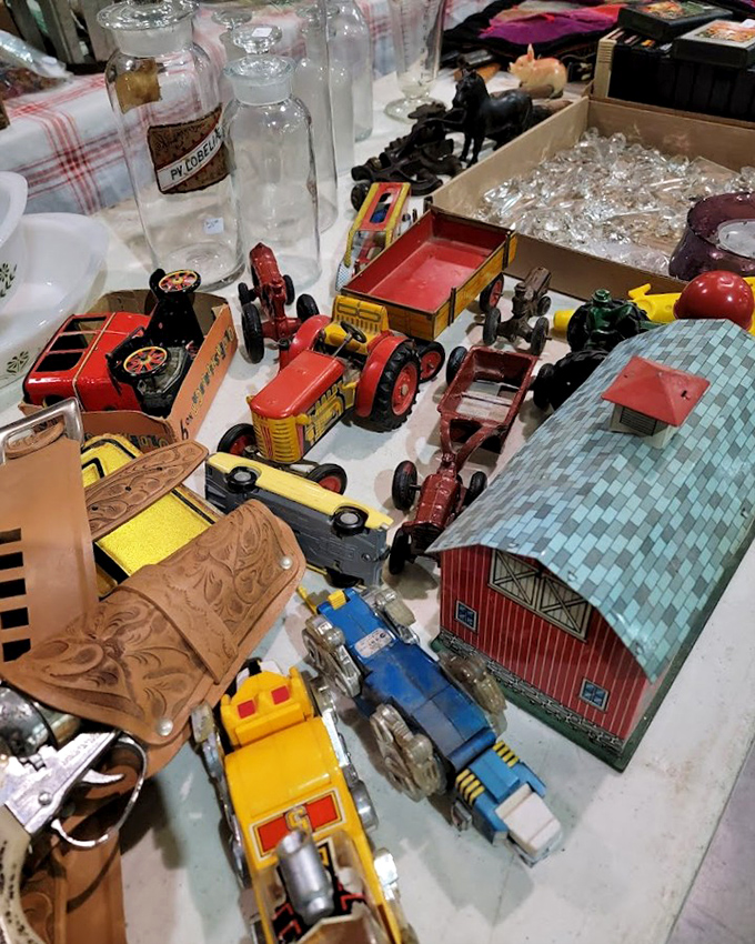 Miniature farm equipment and a tin barn—childhood memories for sale! These toys survived decades before iPads, when imagination was the best app.