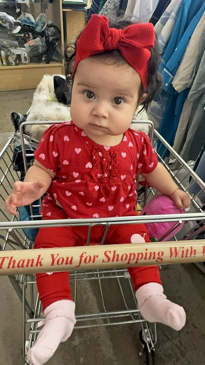 The youngest thrift enthusiast in training! Those wide eyes say it all: "So many treasures, so little shopping cart space."