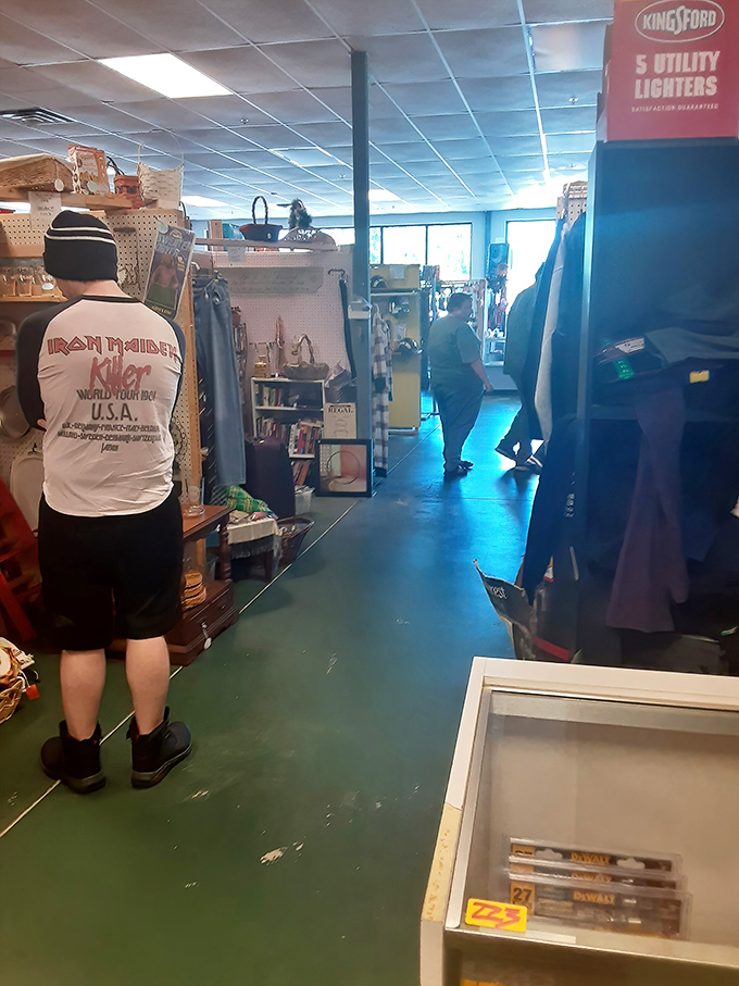 Fellow treasure hunters navigate the maze of merchandise, each on their own quest. That Iron Maiden shirt might just find its second life with a new appreciative owner.