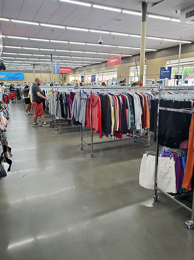 Organized chaos at its finest. The clothing department's methodical layout transforms what could be overwhelming into a manageable treasure hunt.