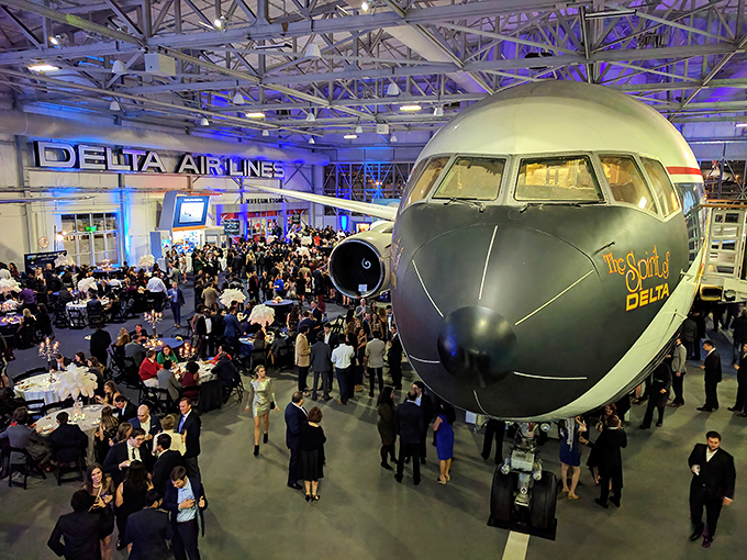Fancy events under airplane noses&mdash;the only gala where "jet-setter" isn't just a metaphor but the actual ceiling decoration.