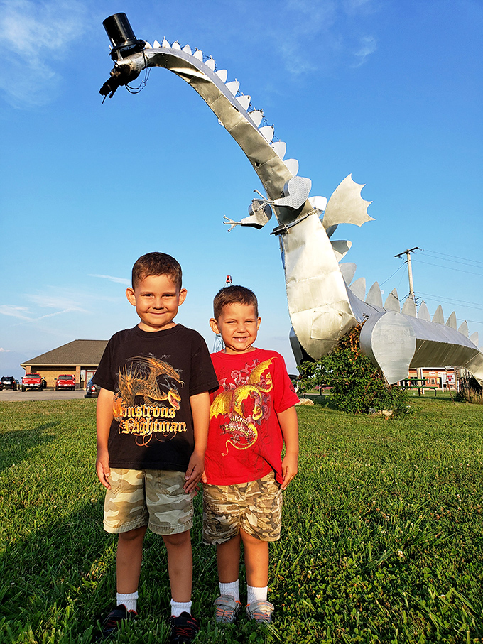 Nothing says "perfect family photo op" quite like posing with a creature that could theoretically turn you into toast.