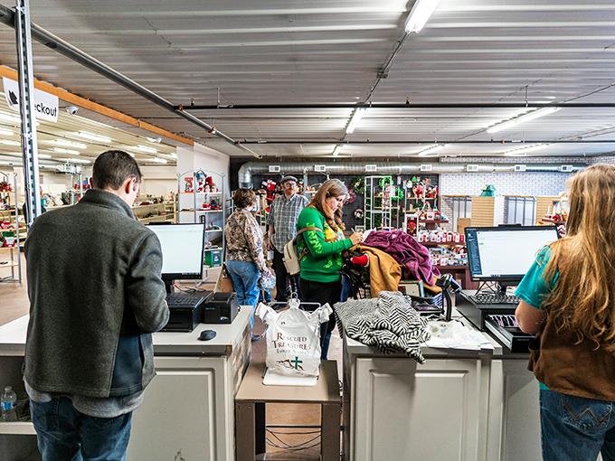 The checkout line: where shoppers experience that unique mix of disbelief and joy when their mountain of finds totals less than a fancy coffee.