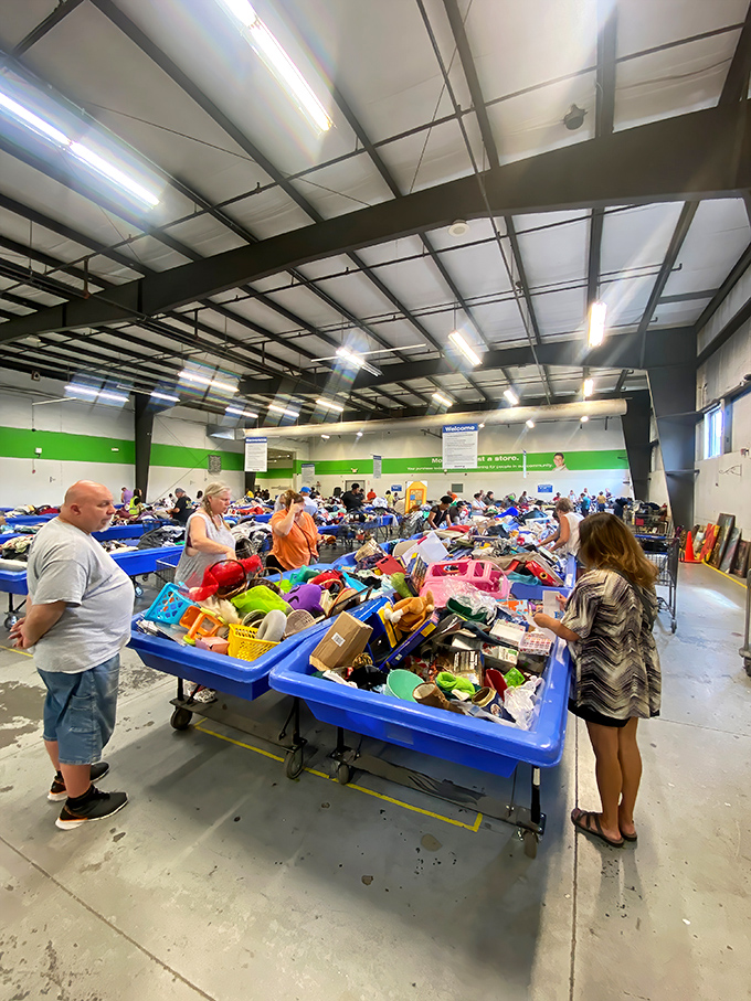 Treasure hunters in their natural habitat, sifting through possibilities. Like archaeologists of modern castoffs, each person searches for their own definition of value.