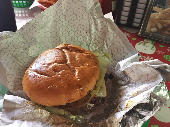 Some burgers are eaten, others are conquered. This towering creation demands strategy, multiple napkins, and absolutely no first-date situations.