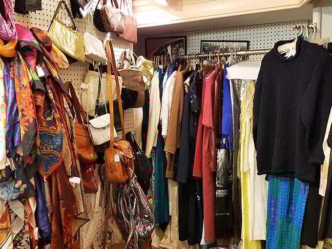 Not your average clothing rack! Vintage scarves and handbags create a kaleidoscope of fashion history that would make Iris Apfel proud. 