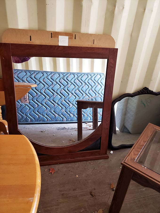 Mirror, mirror on the wall, who's the thriftiest of them all? This wooden-framed beauty could transform any drab wall into a statement piece.