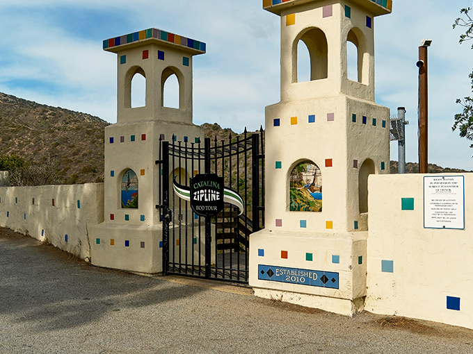 The Zip Line Eco Tour entrance looks like a whimsical castle gateway. Adventure awaits beyond those colorful tiles!