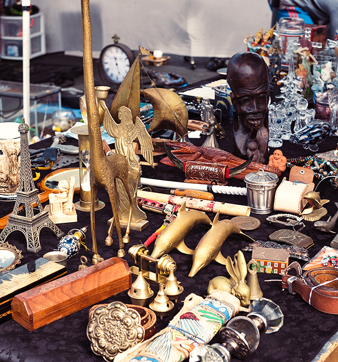 Time travel via tabletop. Where else can you find Eiffel Tower miniatures, carved figurines, and vintage timepieces all competing for your attention?