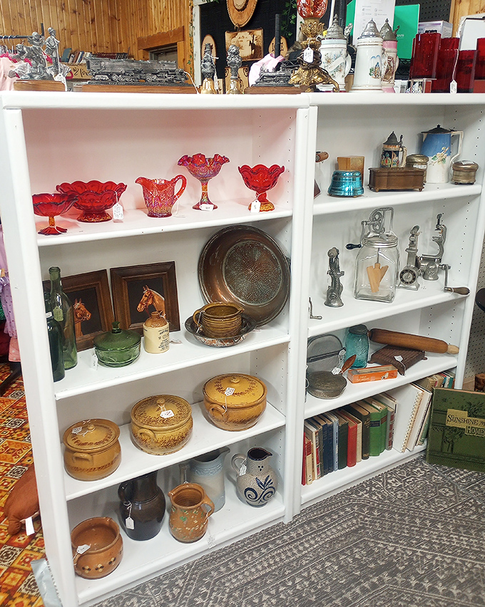 Ruby red carnival glass meets vintage kitchenware in this collector's paradise. Grandma's china cabinet never looked this interesting.