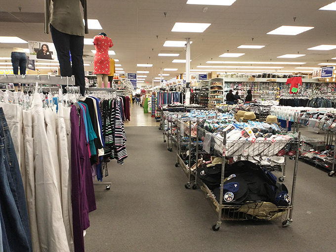 Clothing racks stretching into the distance like a retail yellow brick road, except this one leads to actual savings.