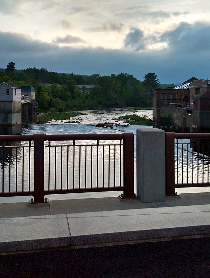 The Millers River flows through Orange like a liquid reminder that some beautiful things remain genuinely accessible.