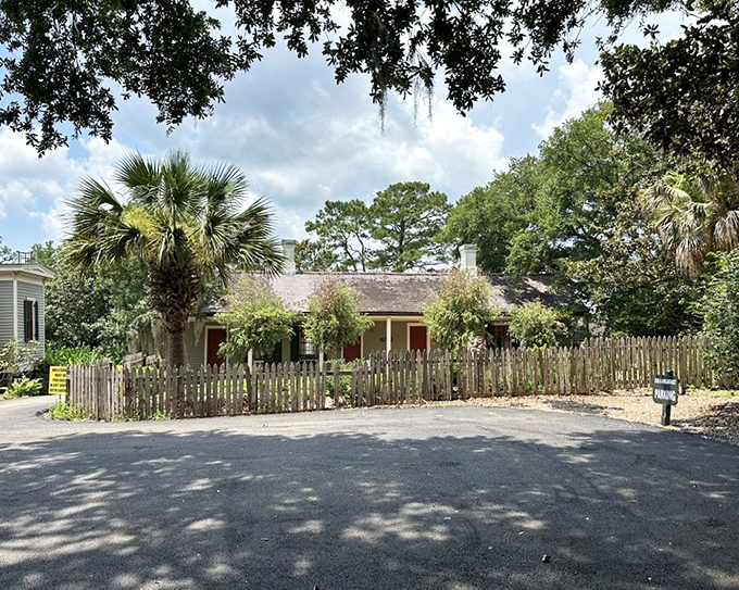 A cottage that belongs in a storybook, complete with picket fence. The kind of place where screen time means sitting on the porch watching hummingbirds.