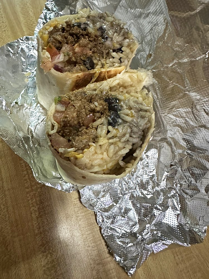 Beef, rice, beans, and cheese create a harmony in this burrito that's more satisfying than finding a parking spot at the beach.