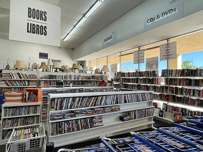 Literary treasures await between "Books/Libros" signs. Yesterday's bestsellers at prices that make Amazon blush.