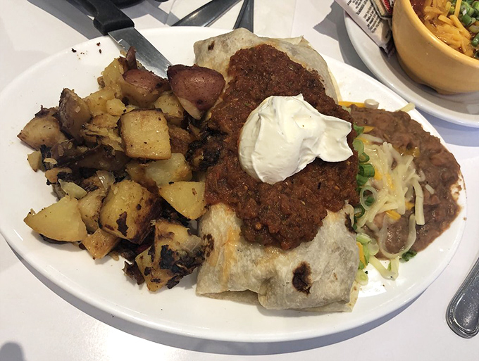 Breakfast burritos should always be this substantial. When your plate arrives with potatoes that perfectly crispy, you know you've made good life choices.