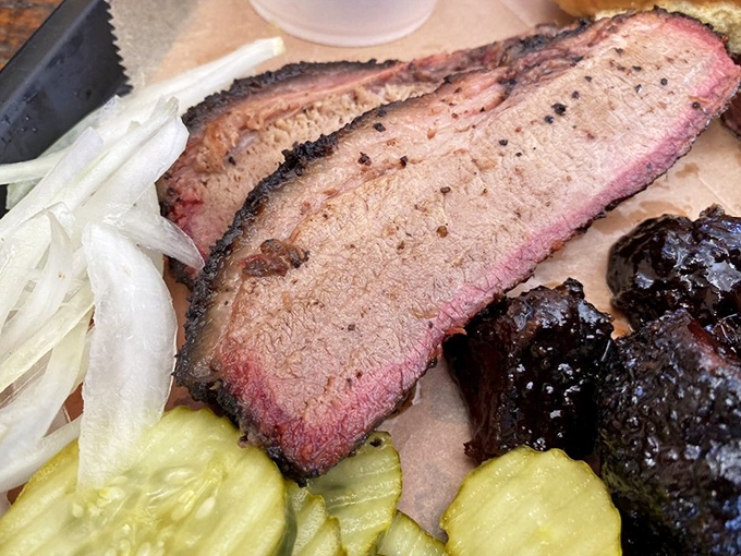 That smoke ring isn't just pretty&mdash;it's a pink badge of honor. Brisket this perfect makes Texans nervous about Florida's rising BBQ game.