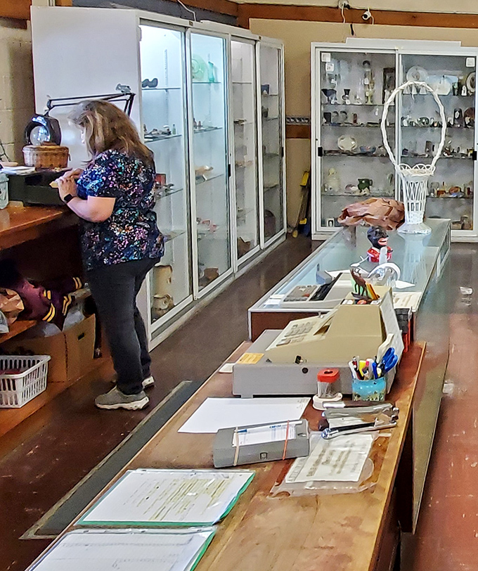 The checkout area&mdash;where dreams meet reality and wallets open willingly. That vintage trunk has stories to tell if you're ready to listen.