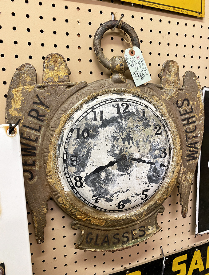 Time literally stands still on this weathered "Jeweler Watches" clock – its patina earned through years of faithful timekeeping.