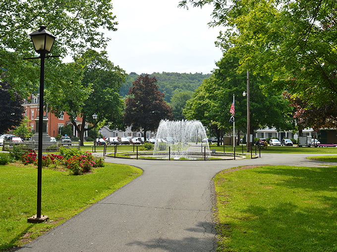 Central Park's fountain creates the perfect soundtrack for a lazy summer afternoon, proving that sometimes the best vacation moments happen when you're doing absolutely nothing.