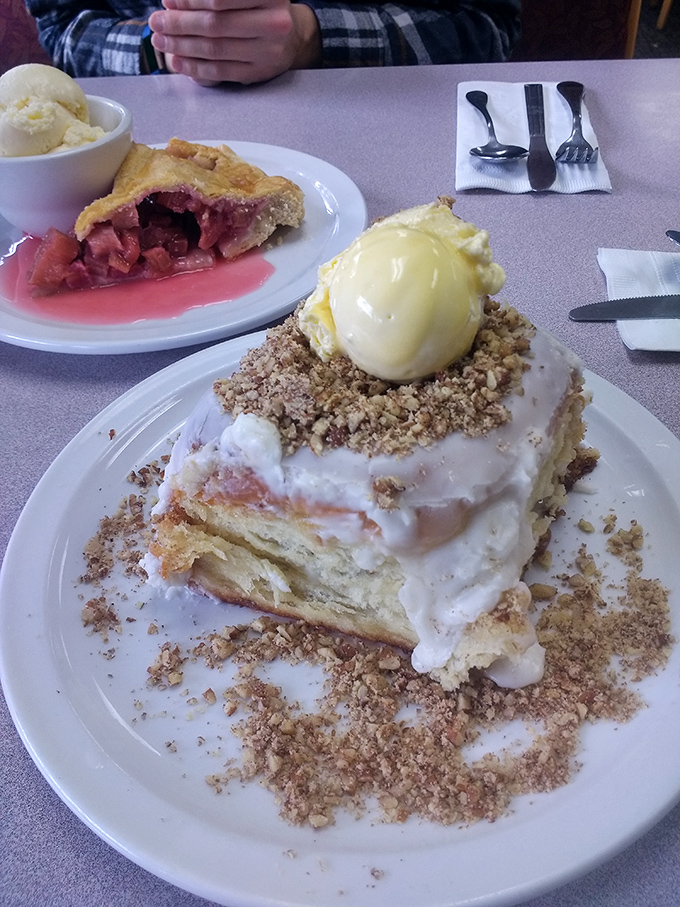 Architecture meets pastry in this towering creation. Layers of buttery pastry, cinnamon, and frosting combine for a dessert masquerading as breakfast.