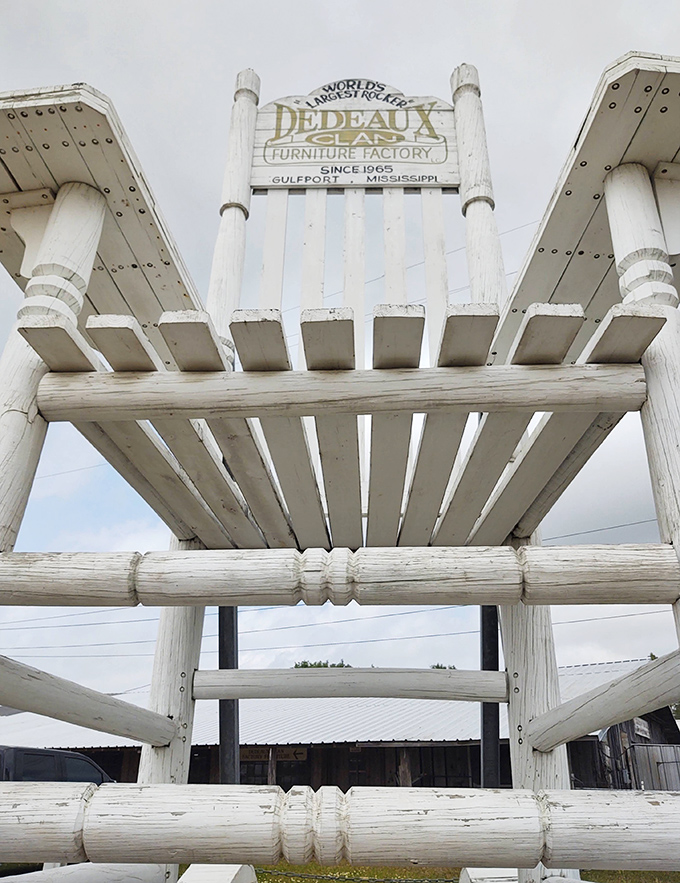 The backrest reaches skyward like a ladder to cloud-level comfort, making every passing cloud jealous.