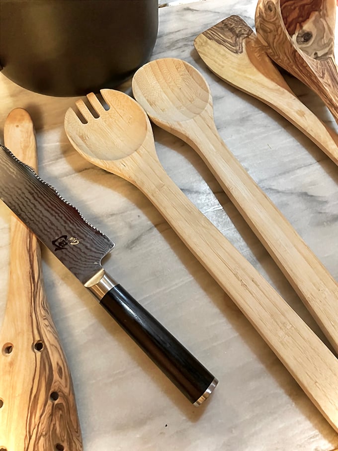These handcrafted wooden utensils bring warmth to any kitchen. That Damascus-style knife would make even amateur chefs feel like culinary royalty.
