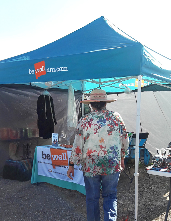 The market isn't just commerce—it's community. Health resources mingle with handicrafts, serving locals and visitors alike under New Mexico's brilliant sky.