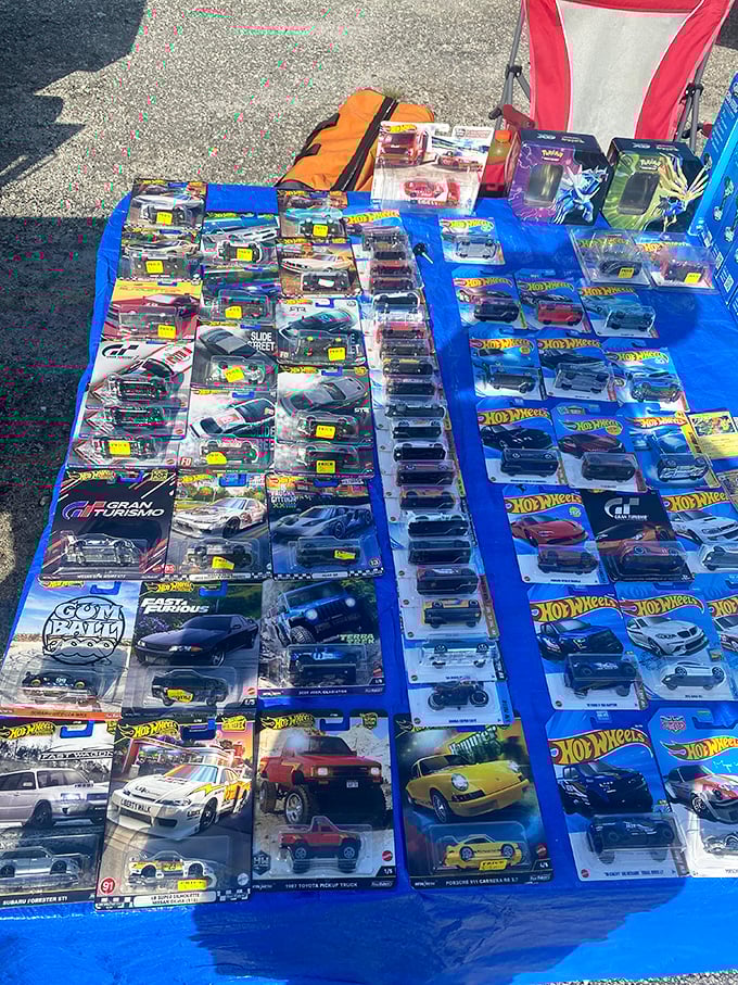 Hot Wheels heaven! Collectors and nostalgic dads alike hover over these miniature automotive dreams, reliving childhood races.