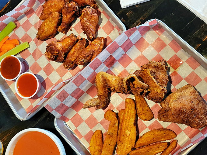 When your plate arrives looking like this, you know you've made excellent life choices. Crispy wings and seasoned fries&mdash;a match made in comfort food heaven.