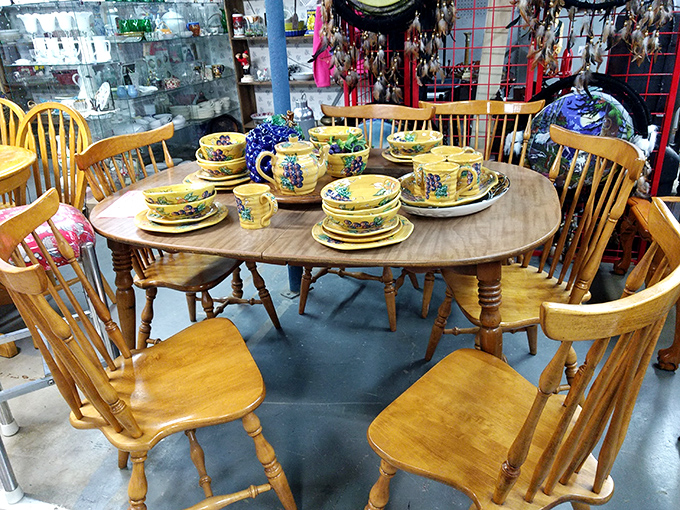 This oak dining set isn't just furniture; it's future Sunday dinners and Thanksgiving memories waiting to happen. The grape-patterned dishes seal the deal.