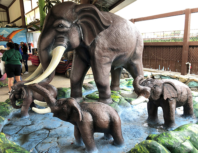Elephant family sculpture bringing unexpected charm to the market. Art finds lurk in the most surprising corners!
