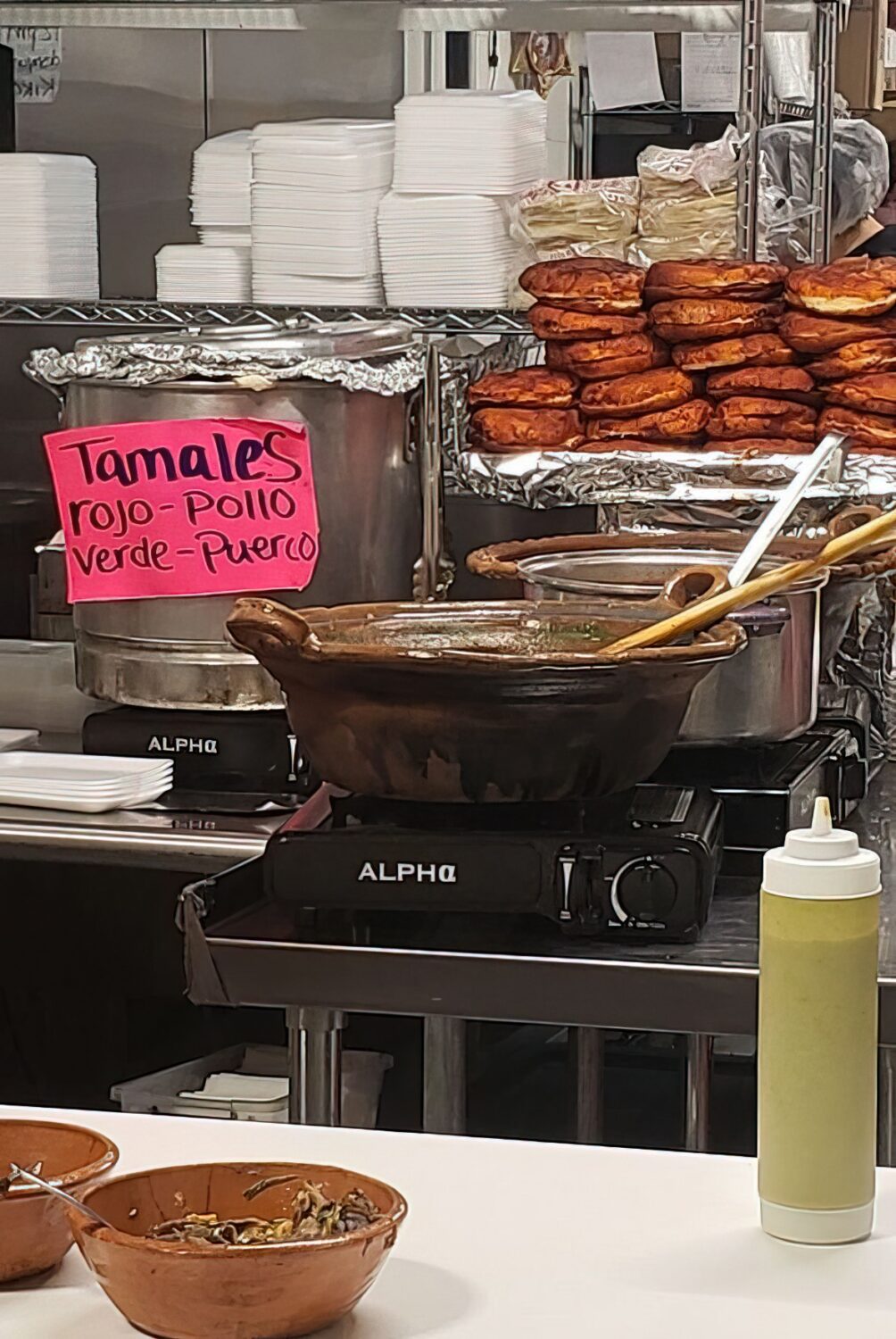 Tamales rojo, verde, and pollo steam invitingly in their pots, the kind of authentic cooking that makes chain restaurants weep with inadequacy. 
