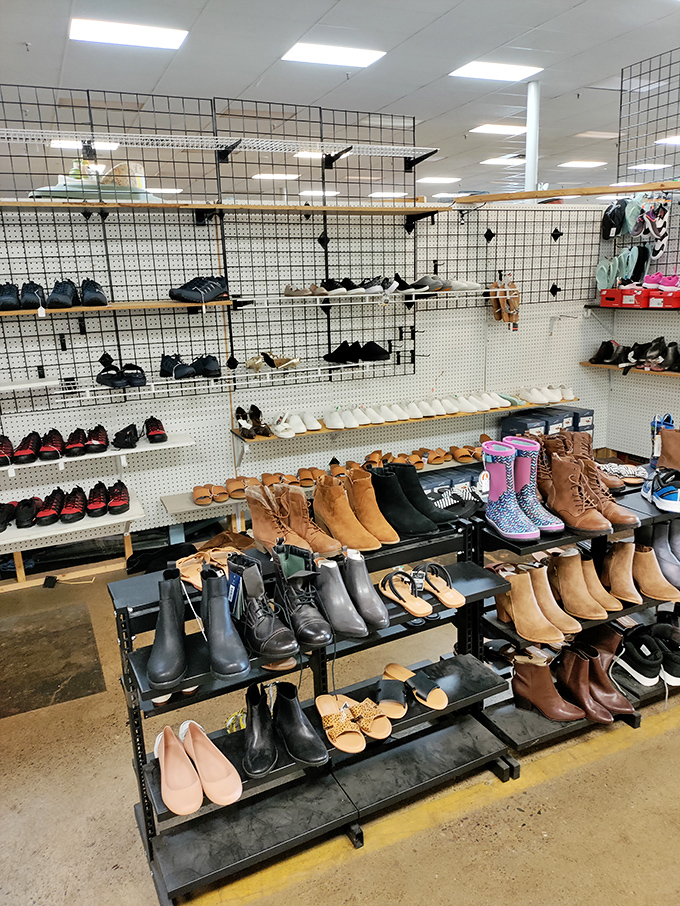 A footwear fantasyland where boots, sneakers, and heels stand at attention, waiting for Cinderella moments with new owners.