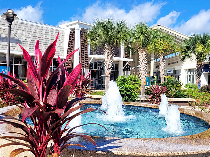 Nature meets retail in this tranquil fountain oasis. Palm trees and water features—because sometimes your credit card needs a meditation break.