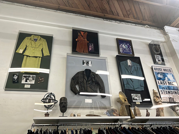 The wall of fame showcases iconic pieces in their natural habitat&mdash;behind glass, not unlike the celebrities who once wore them on screen.