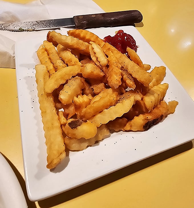 These aren't just french fries&mdash;they're supporting actors in the butter drama. Crispy, golden, and ready to mop up any escaped butter from your burger expedition.