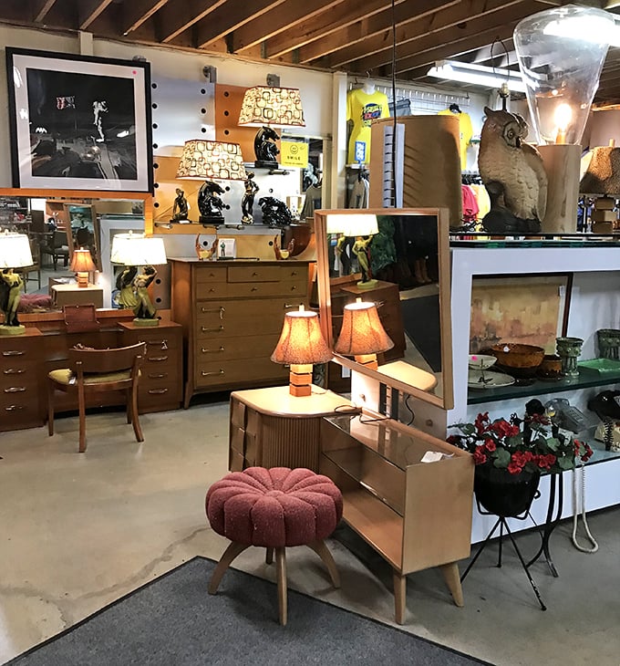 Mid-century furniture vignettes that make you question every boring beige purchase you've ever made. That pink tufted ottoman is basically furniture candy.