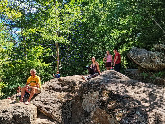 Taking a breather on nature's perfect lounge chairs. These sun-warmed rocks invite hikers to pause and soak in the view.