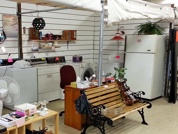 Vintage appliances with second-act potential. That park bench nestled between washers isn't just seating—it's an invitation to imagine possibilities for your own home.