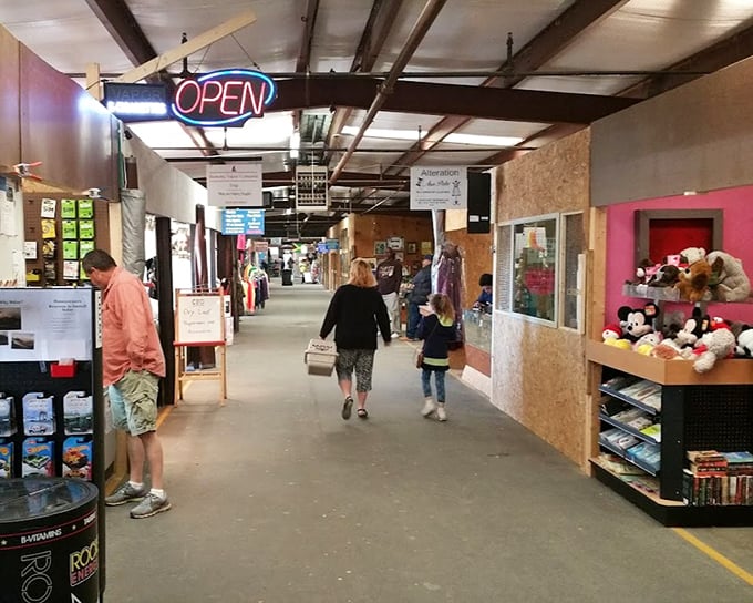 Family adventures unfold between these humble walls. The neon "OPEN" sign might as well read "OPPORTUNITY."