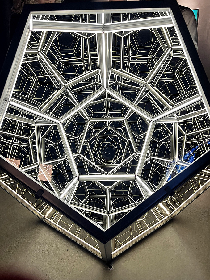 Step into the Infinity Room and suddenly you're starring in your own sci-fi movie, multiplied endlessly in a kaleidoscope of reflections. 
