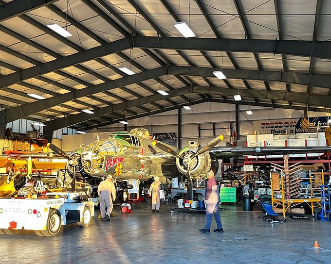 Inside the hangar, where history gets its tune-up. Volunteers lovingly restore these magnificent machines to their former glory.
